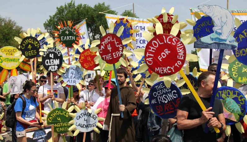 Catholics bring Pope Francis' call to protect creation to climate march ...