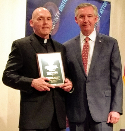 Two archdiocesan priests honored for service by law enforcement ...